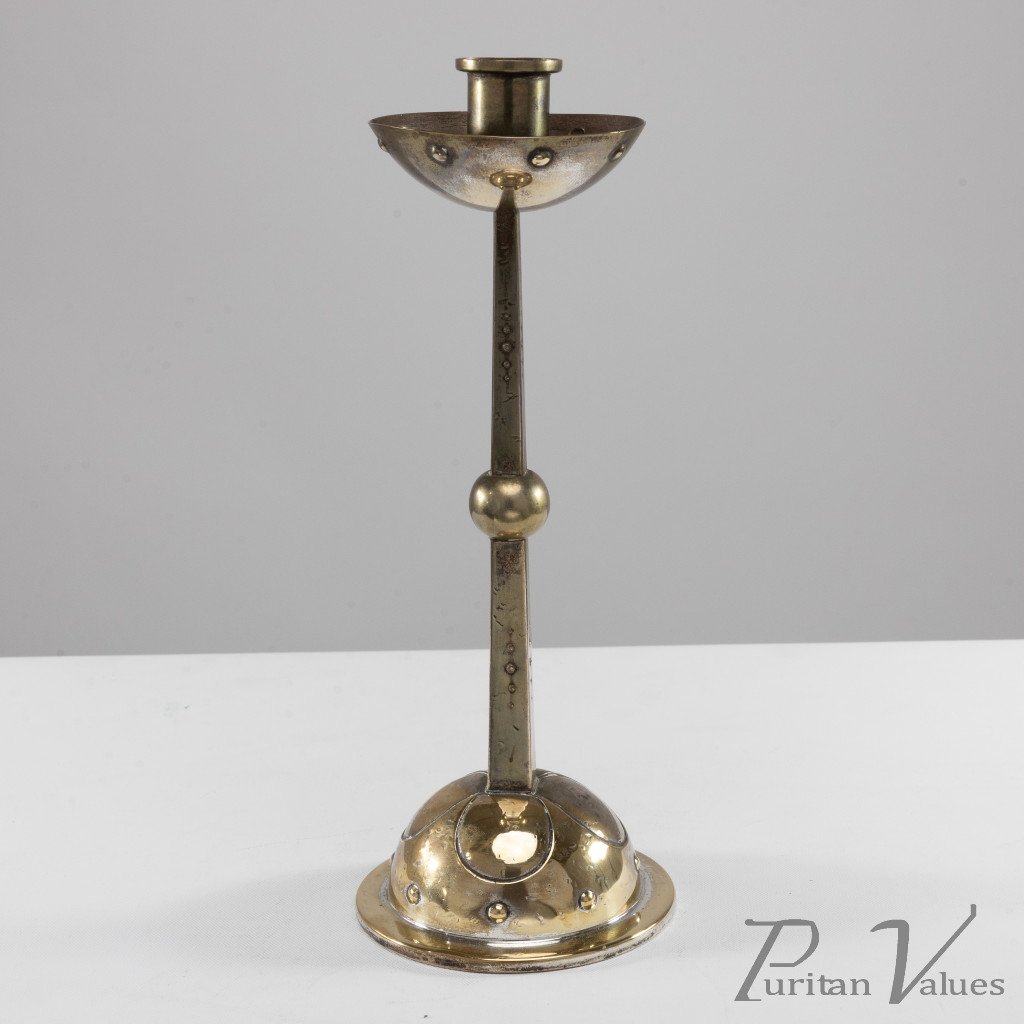 WMF An Arts & Crafts silver-plated candlestick with bowl shaped drip ...