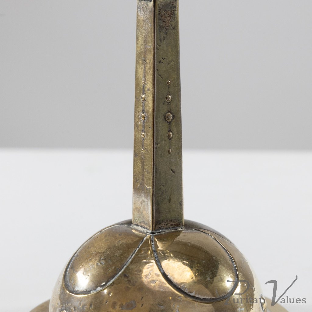 WMF An Arts & Crafts silver-plated candlestick with bowl shaped drip ...