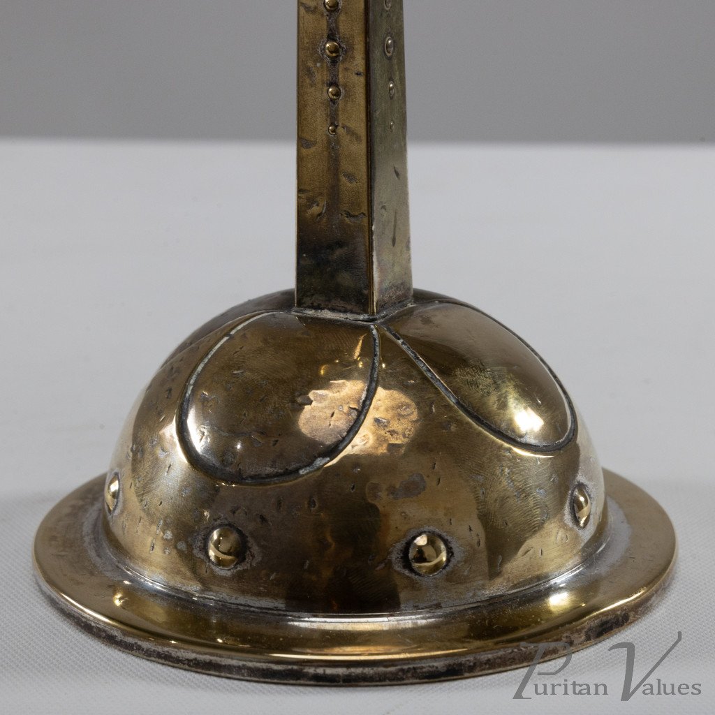 WMF An Arts & Crafts silver-plated candlestick with bowl shaped drip ...