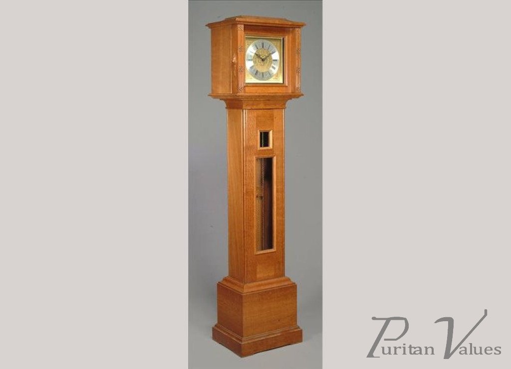Robert Mouseman Thompson. A rare oak longcase clock - Puritan Values
