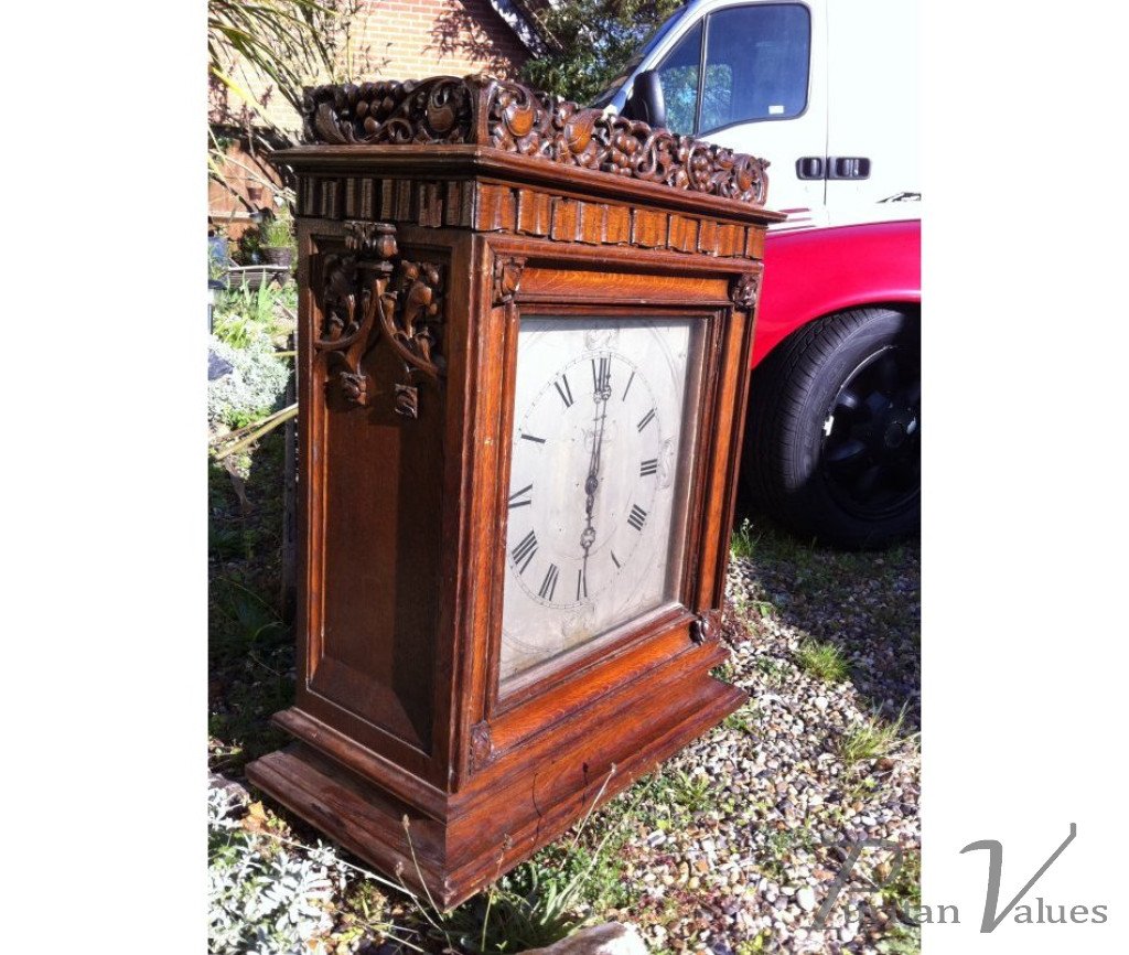 An important Gothic Revival oak bracket clock from Middlesex Guildhall ...
